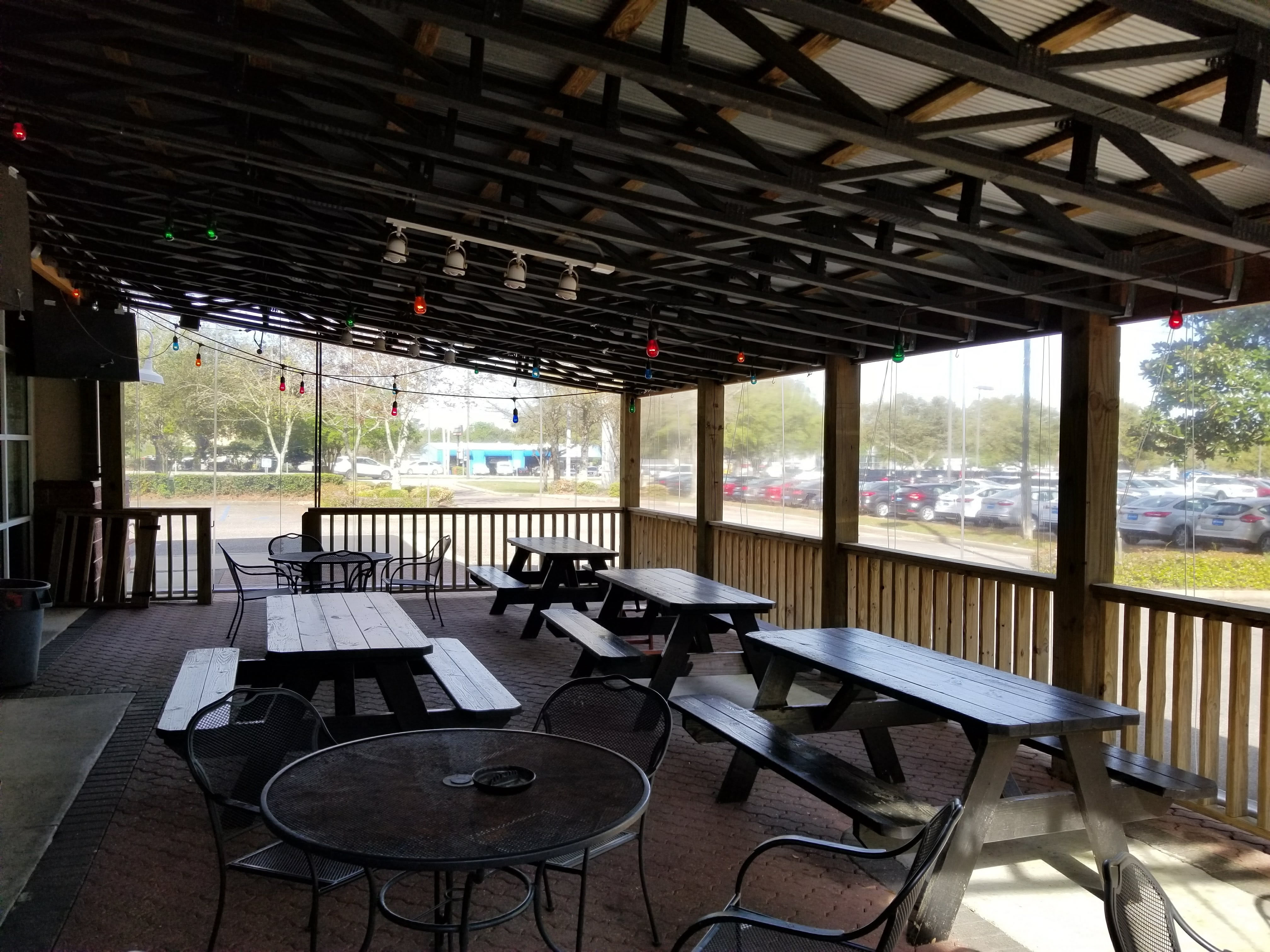 dining porch with clear curtain | ETP Tarps and Curtains